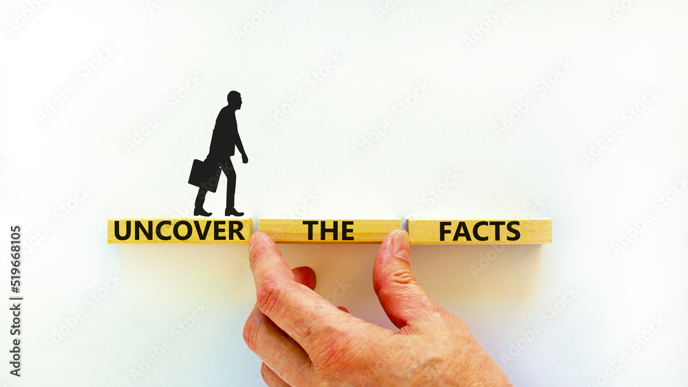 Uncover the facts symbol. Concept words Uncover the facts on wooden ...