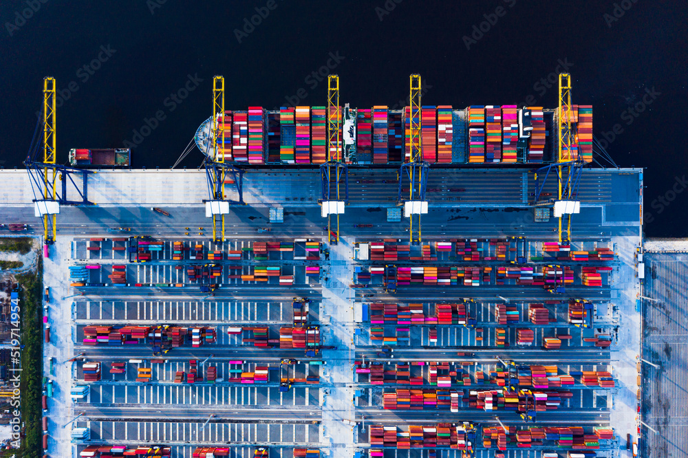 Aerial top view of container ship loading and unloading in cargo ...