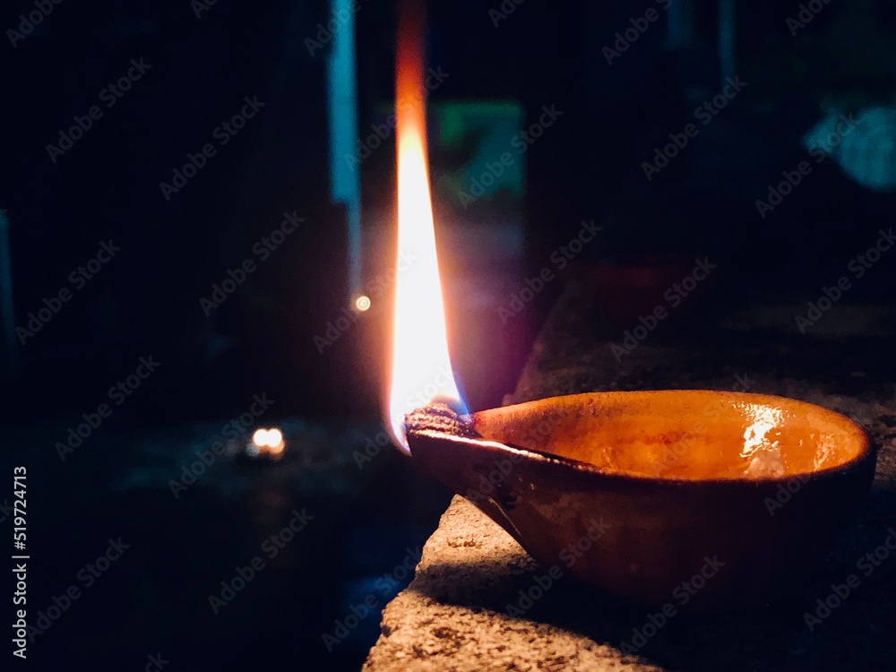 Lamp lightened up and glows in the dark night during the Karthika ...