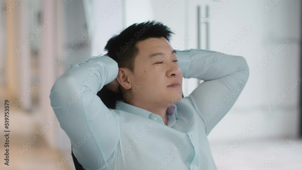 Rest at work. Pensive middle aged asian businessman relaxing at ...