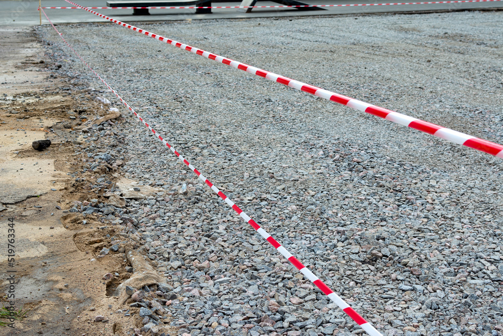 Red and white warning tape at the construction site Stock Photo | Adobe ...