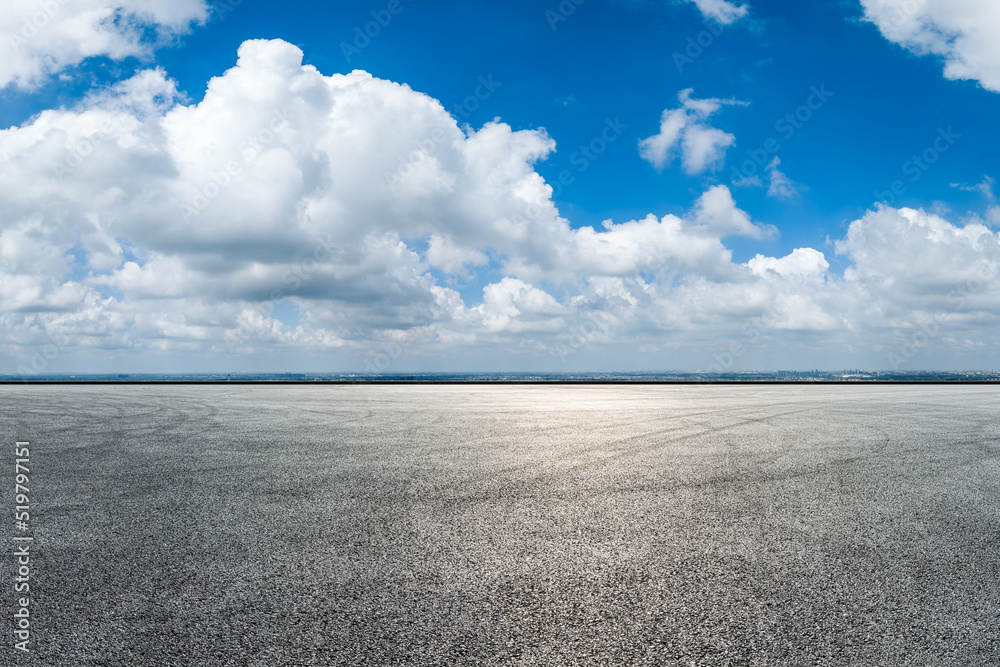 Empty asphalt road and city skyline with sky cloud scenery Stock Photo ...