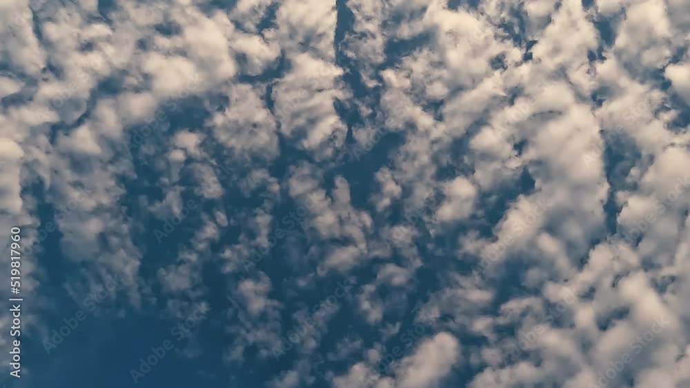 Fast Moving Cloud Time Lapse Background. Light and fluffy low cloud cover moves in front of ...