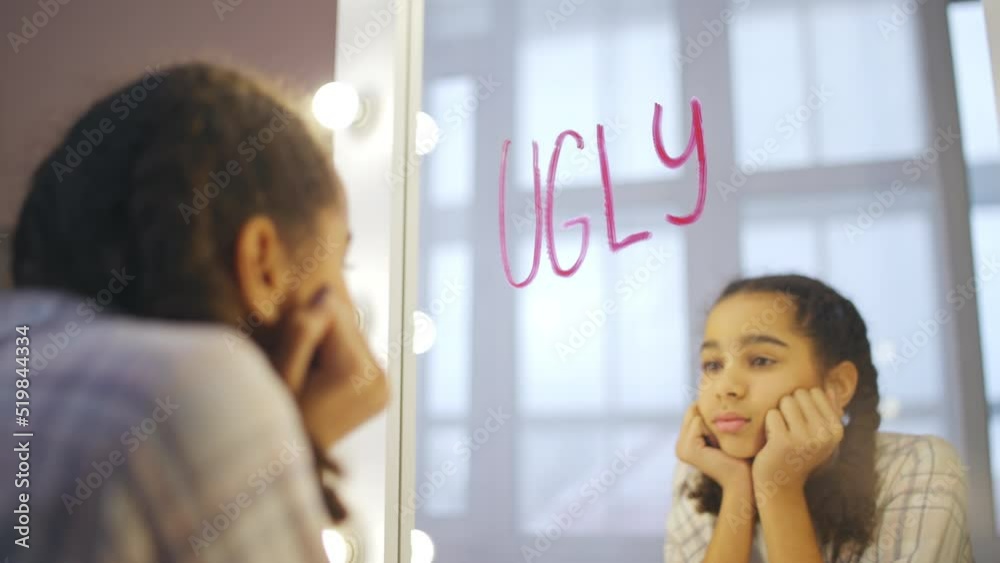 Teenage girl having appearance insecurities, victim of bullying, peer ...