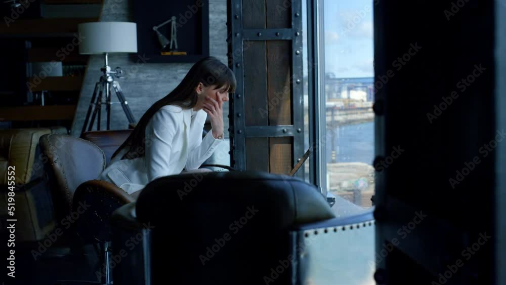 Corporate manager using laptop in sea view room. Ceo thinking working ...