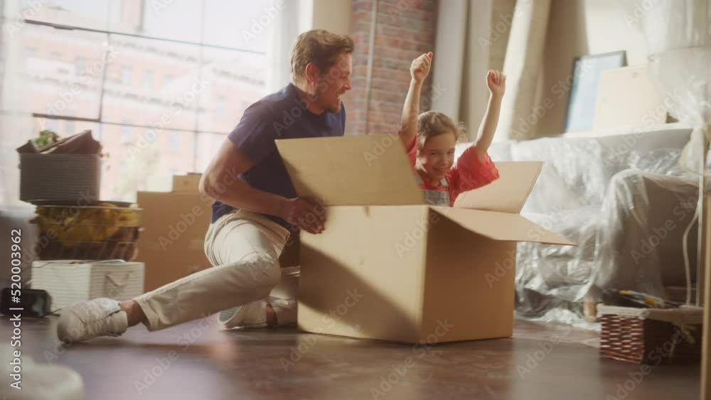 Moving in: Young Family of New Homeowners Has Fun. Father Driving ...