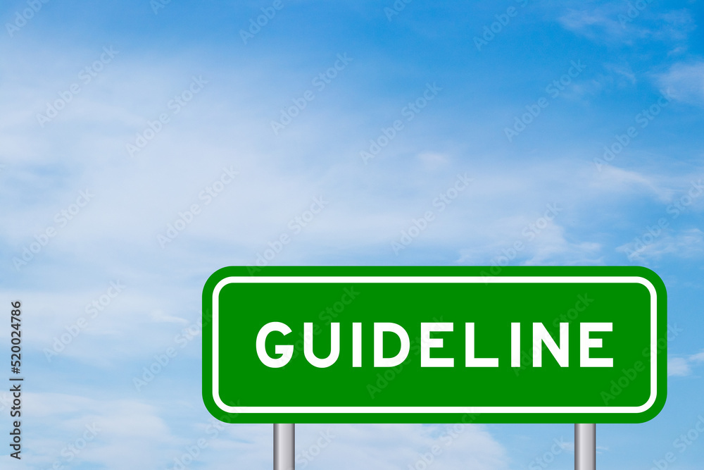 Green color transportation sign with word guideline on blue sky with ...