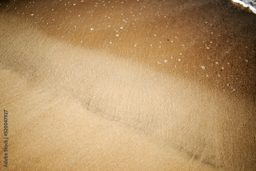 Sand on the sea beach. Sand and water. Stock Photo | Adobe Stock