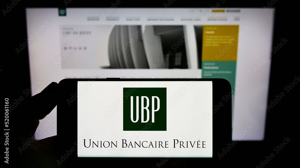 Foto de Stuttgart, Germany - 01-08-2022: Person holding smartphone with ...