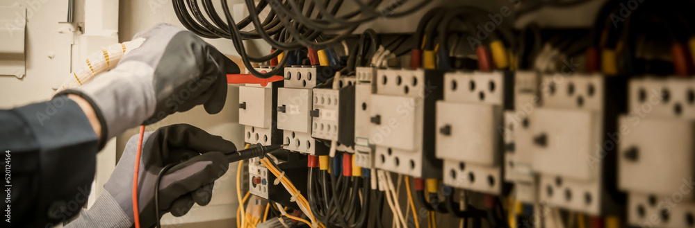 Electricity and electrical maintenance service, Engineer hand holding ...