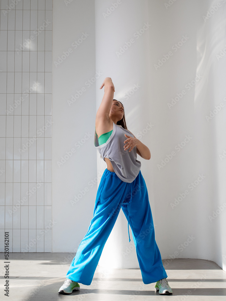 Youth jazz-funk dance style. Young and free, dancing in baggy clothes ...