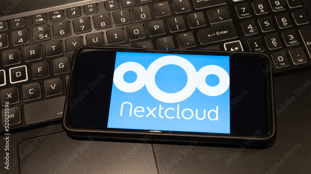 nextcloud logo on mobile phone , background is a keyboard July 30 2022 ...