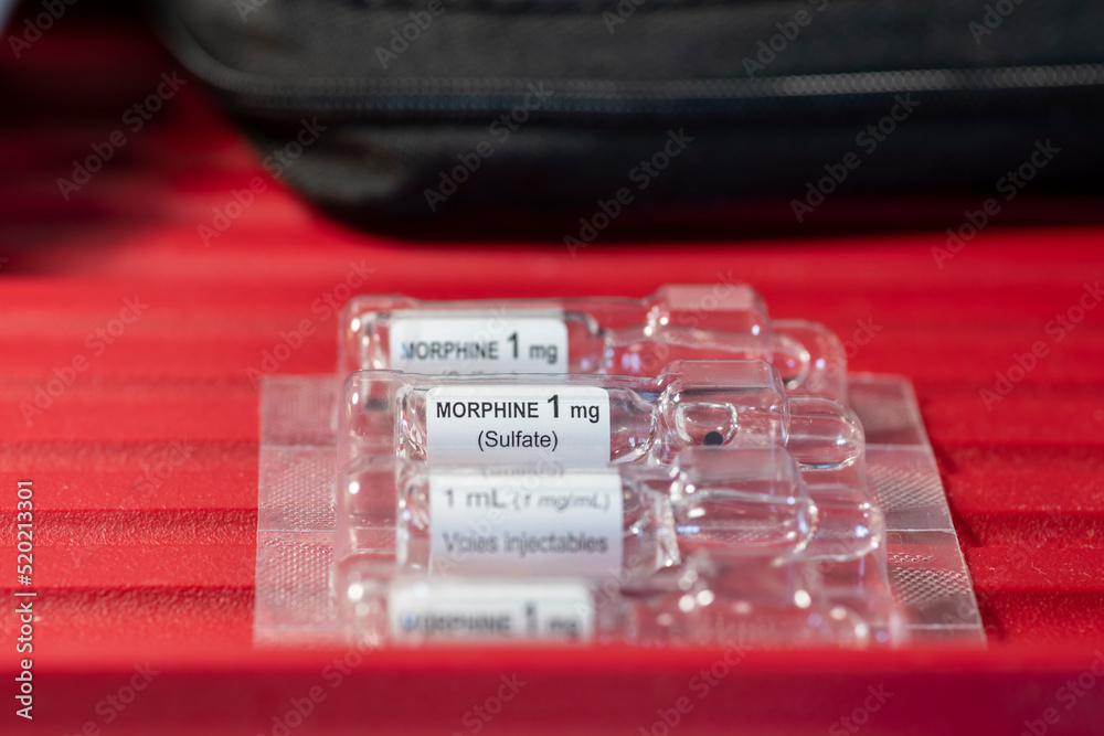 Detailed shot of 1 mg/ml vials of morphine sulfate for injections or ...