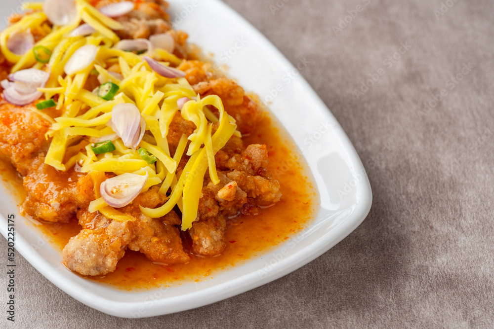 crispy chicken with mango sauce or Ayam Saus Mangga. The taste is ...