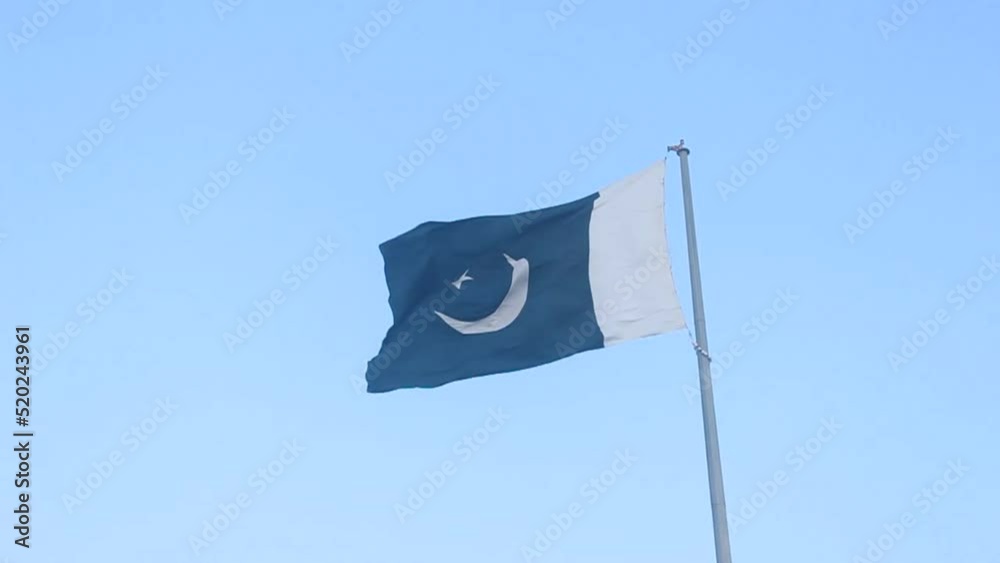 Pakistan Flag cinematic shot. 30 fps . Pakistan flag waving in the wind ...