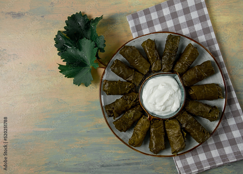 Dolma, cabbage rolls in grape leaves, Traditional Armenian dish, with ...