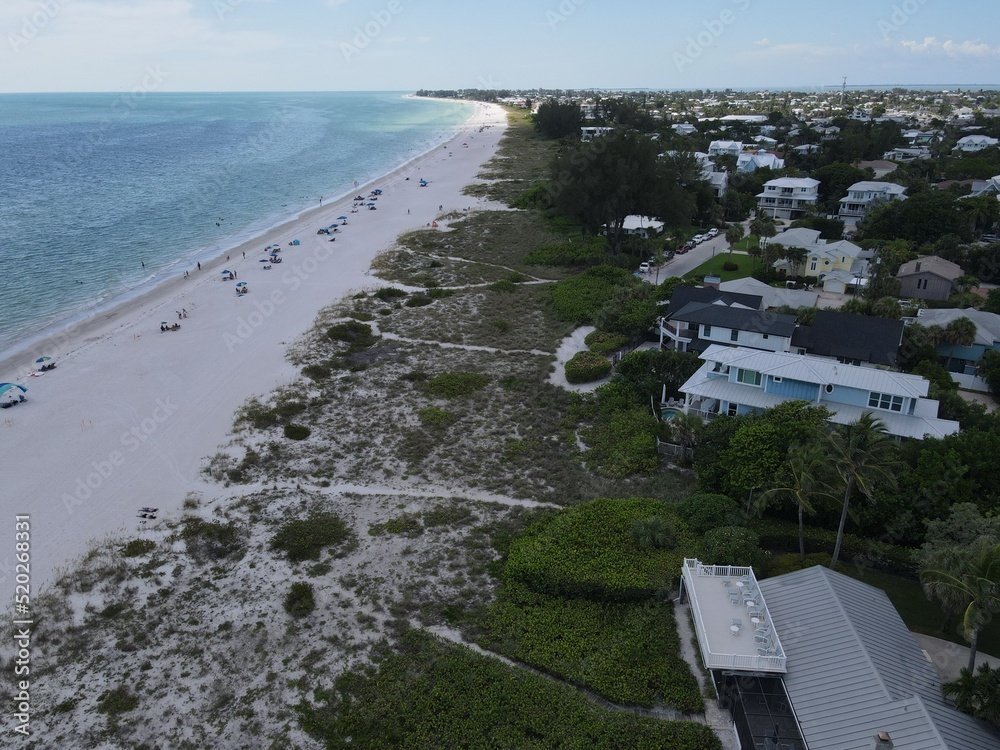 White sand beaches are a quick walk away with family on Anna Maria ...