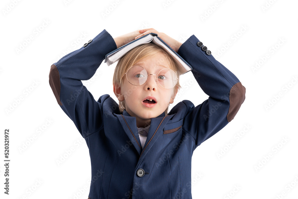 Emotional boy holding book as house above his head. Caucasian kid ...