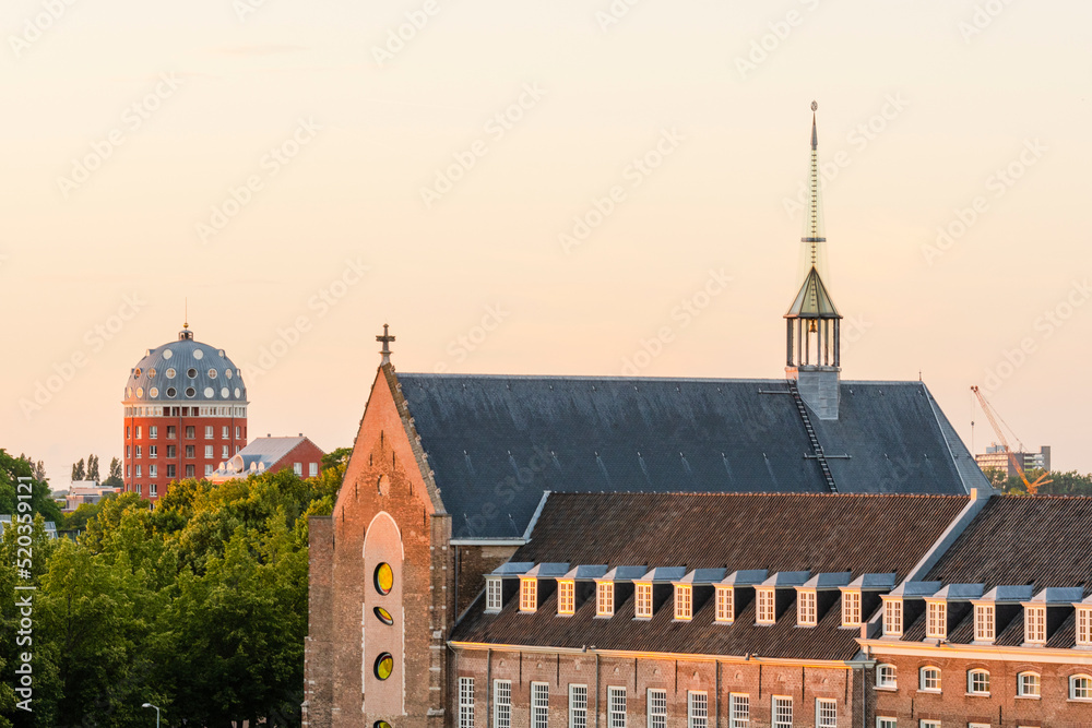 Cityscape small northern european city. European church surrounded by ...