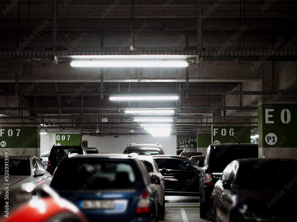 Underground Cars parking in asphalt parking lot in a row with depth of ...