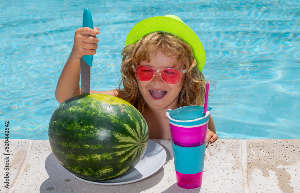 Kid boy hold watermelon relaxing in pool. Child swimming in water pool ...