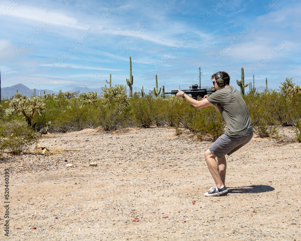 Person moving and shooting during firing range drill while carying ar15 ...