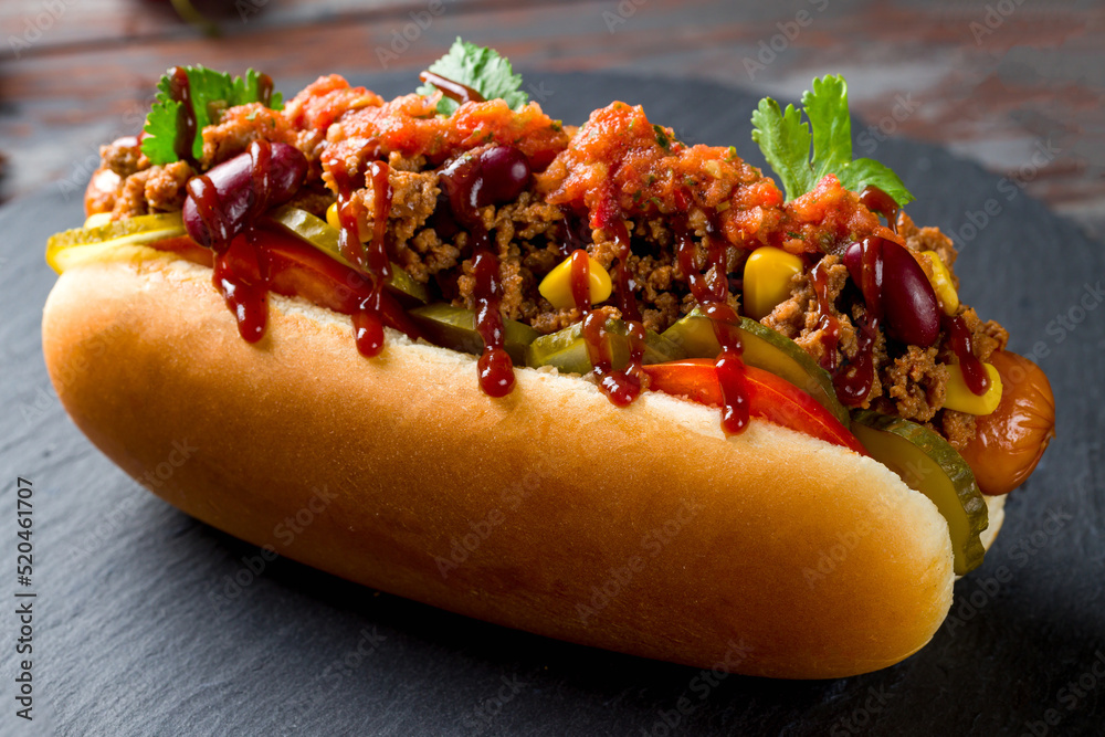 hot dog Mexican with jalapeno, corn and meat, chili con carne macro ...