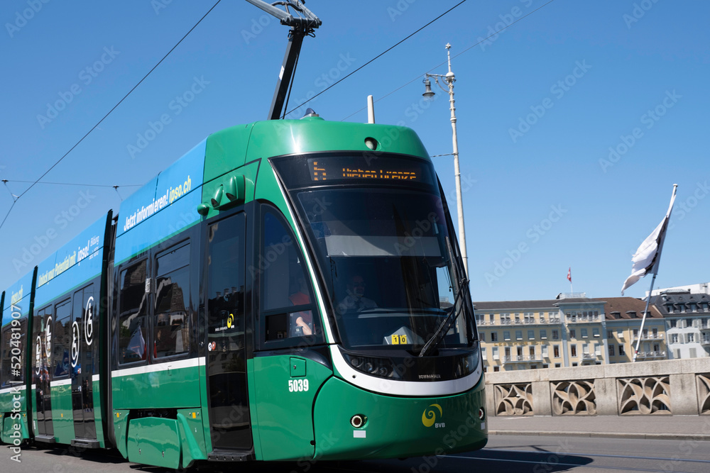 Fotka „BASEL, SWITZERLAND - JULY 10 2022: Electric tram of the public ...