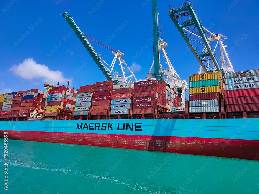 Container ship at Port Miami, one of the largest cargo ports in the US ...