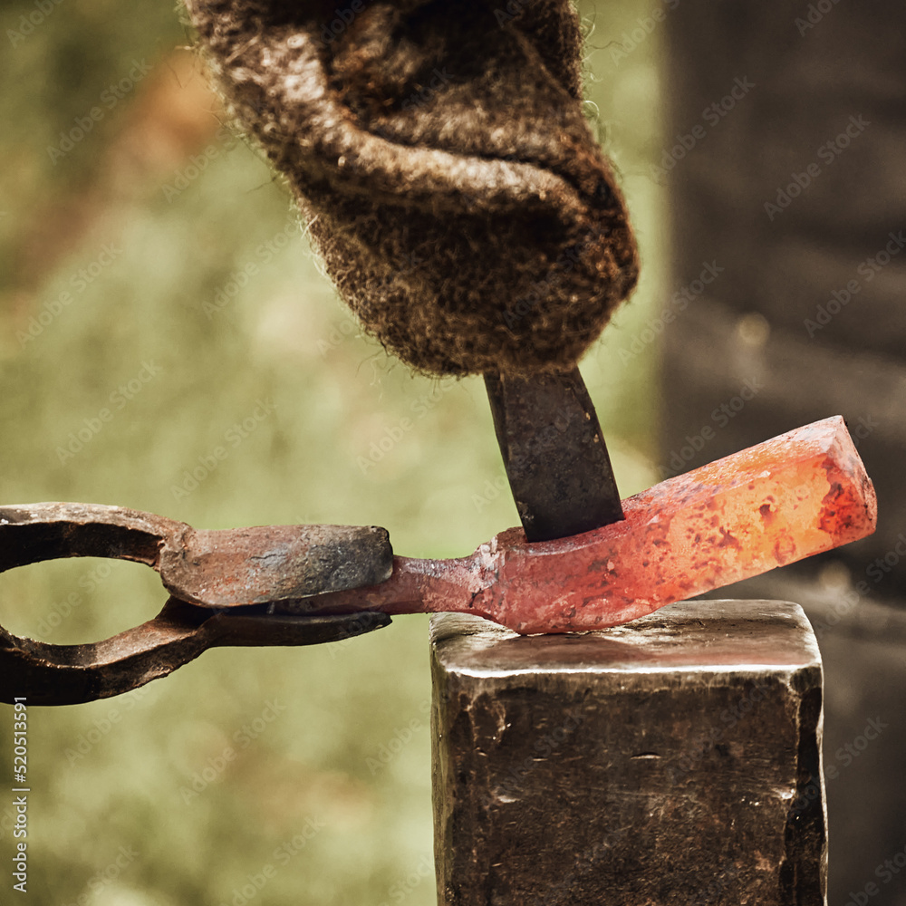 Work of a medieval blacksmith for the manufacture of metal products ...