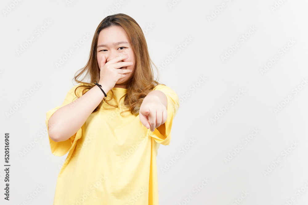 Laughing and Pointing at camera of Beautiful Asian Woman wearing yellow ...