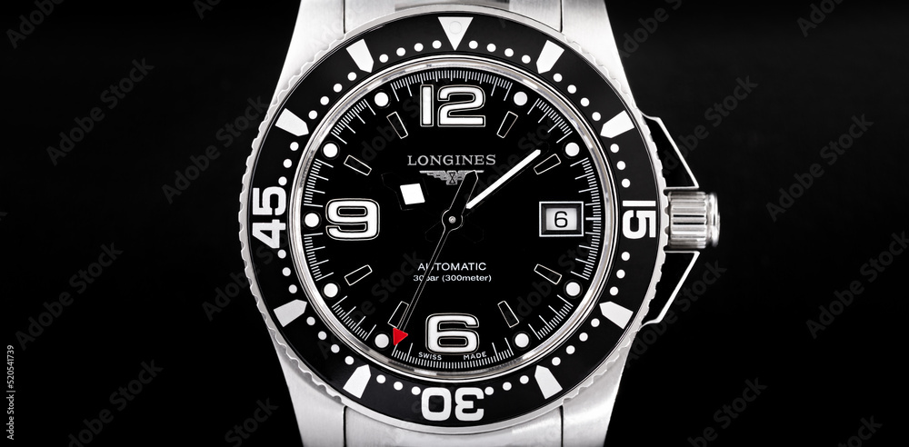 Extreme closeup of Longines luxury wrist watch with black face and ...