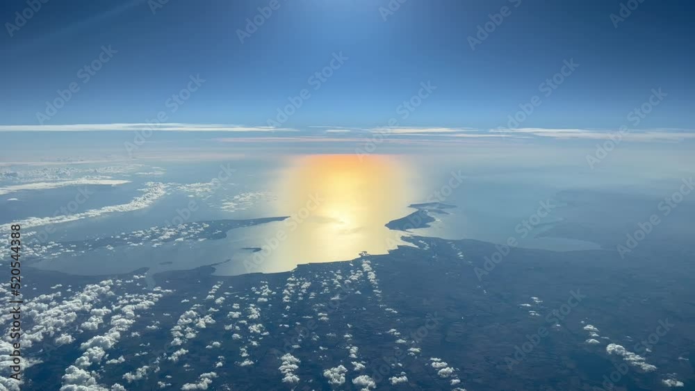 Awesome aerial view at 12000 metres high from a jet cockpit, pilot ...