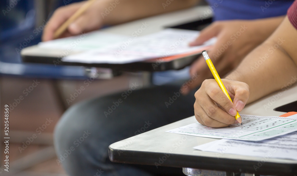 high school,university student study.hands holding pencil writing paper ...