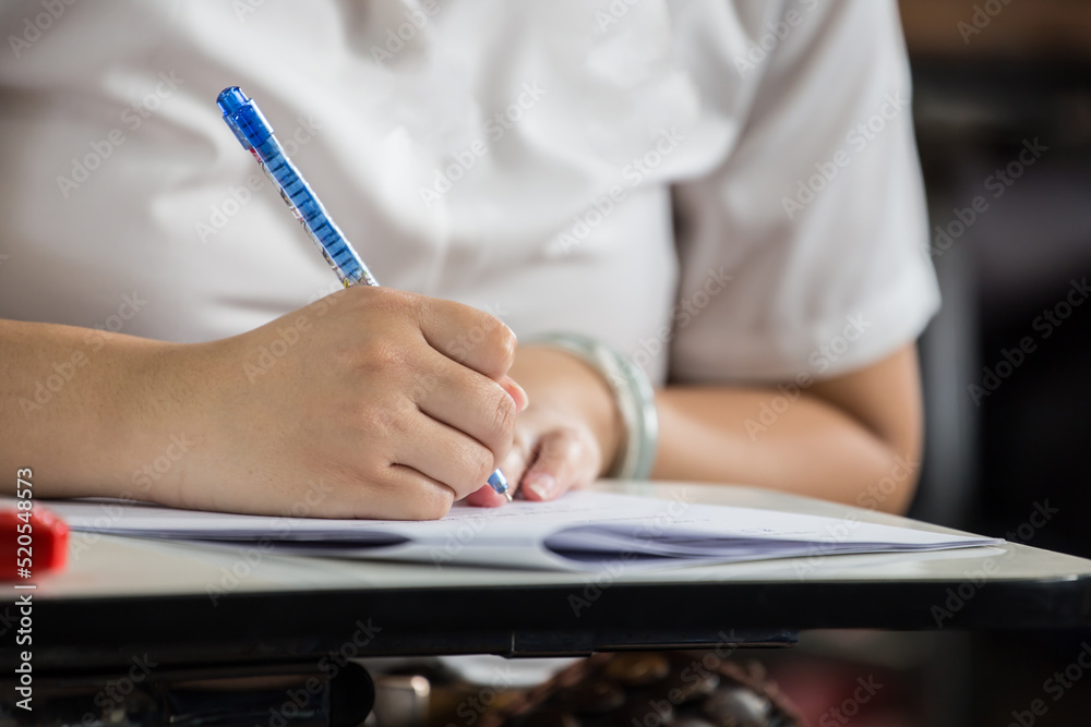 high school,university student study.hands holding pencil writing paper ...