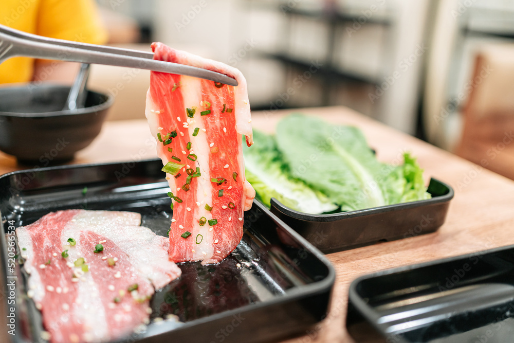 A rare slice of A5 Saga Wagyu with high marble texture season with ...