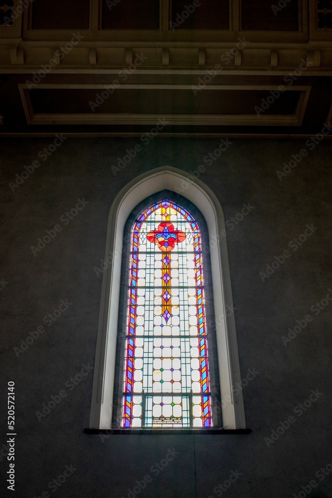 Interior of a church with a beautiful stained glass window Stock Photo ...