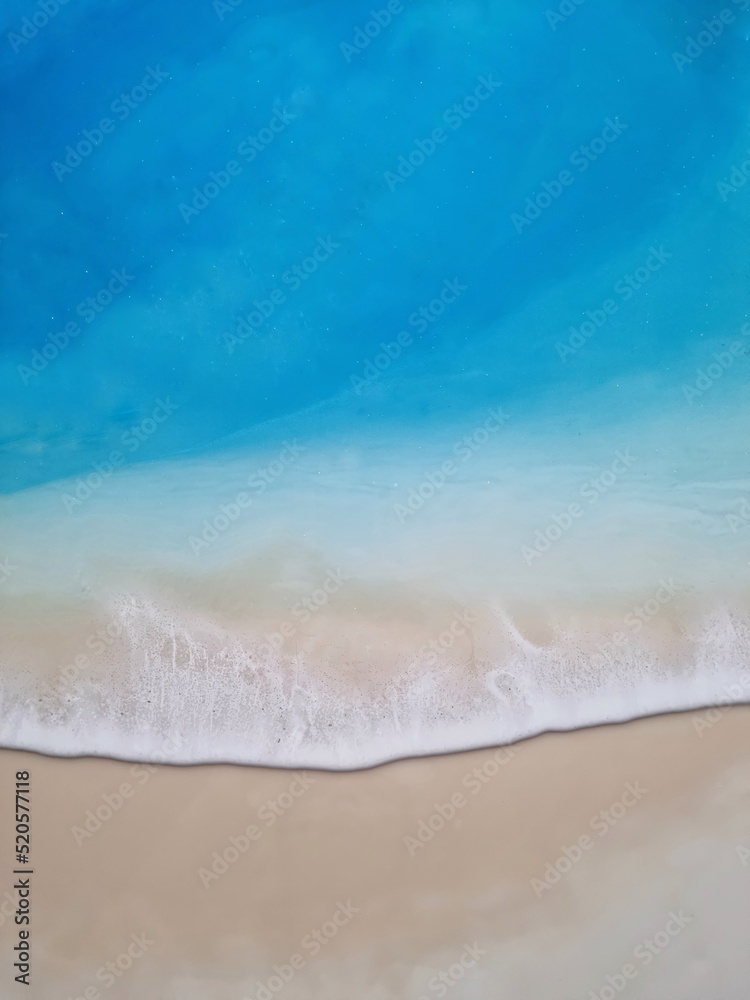 Summer sandy beach drawing by epoxy resin. Top view on ocean wave with ...