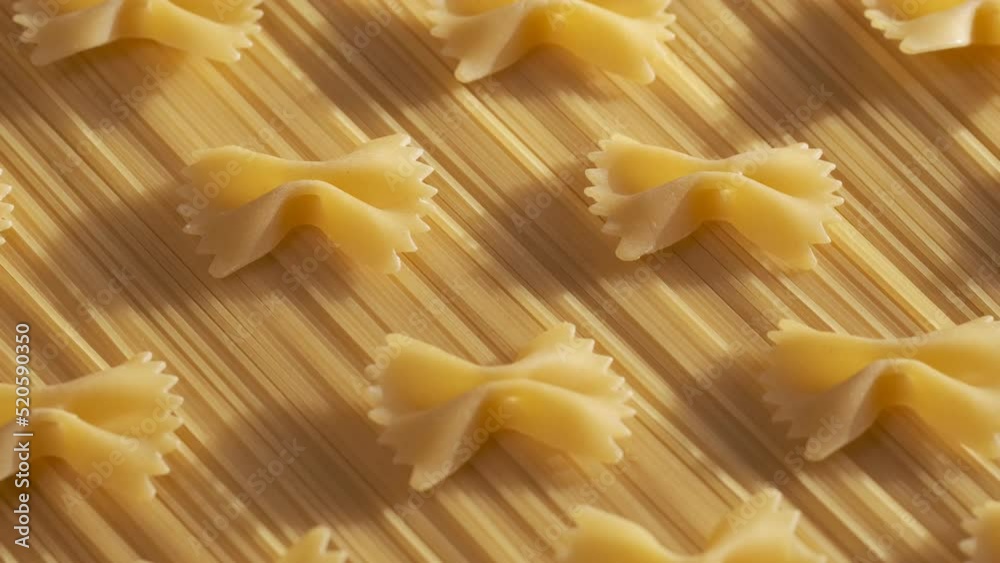 Background Of Spaghetti Pasta. Uncooked Italian Pasta Golden Rotating ...