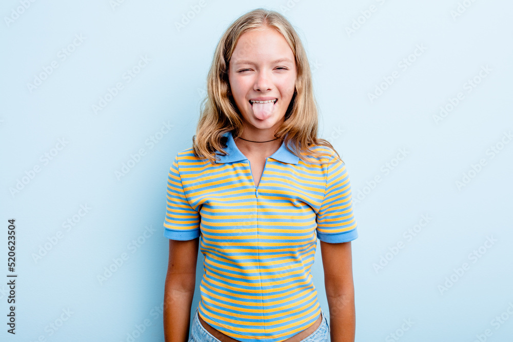 Caucasian teen girl isolated on blue background funny and friendly ...