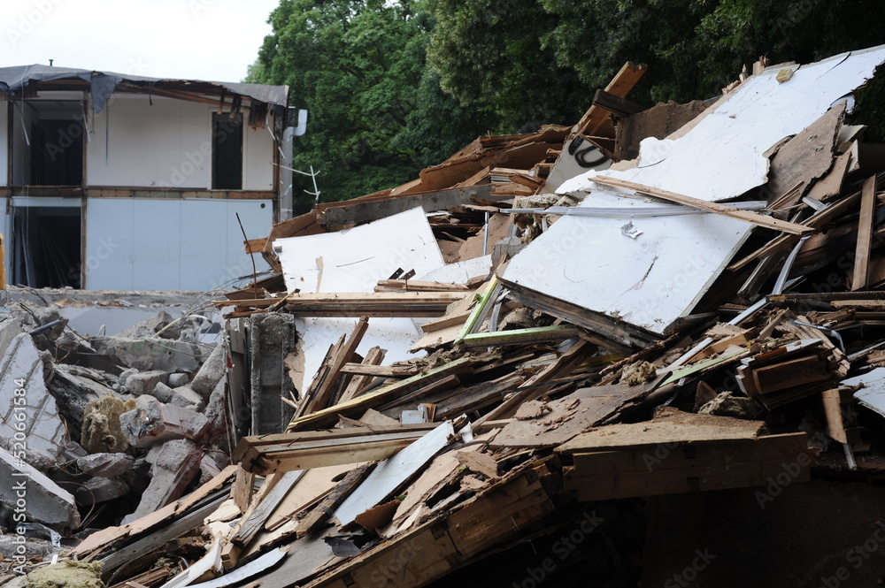 Demolition of a building in deconstruction site with debris, remains ...