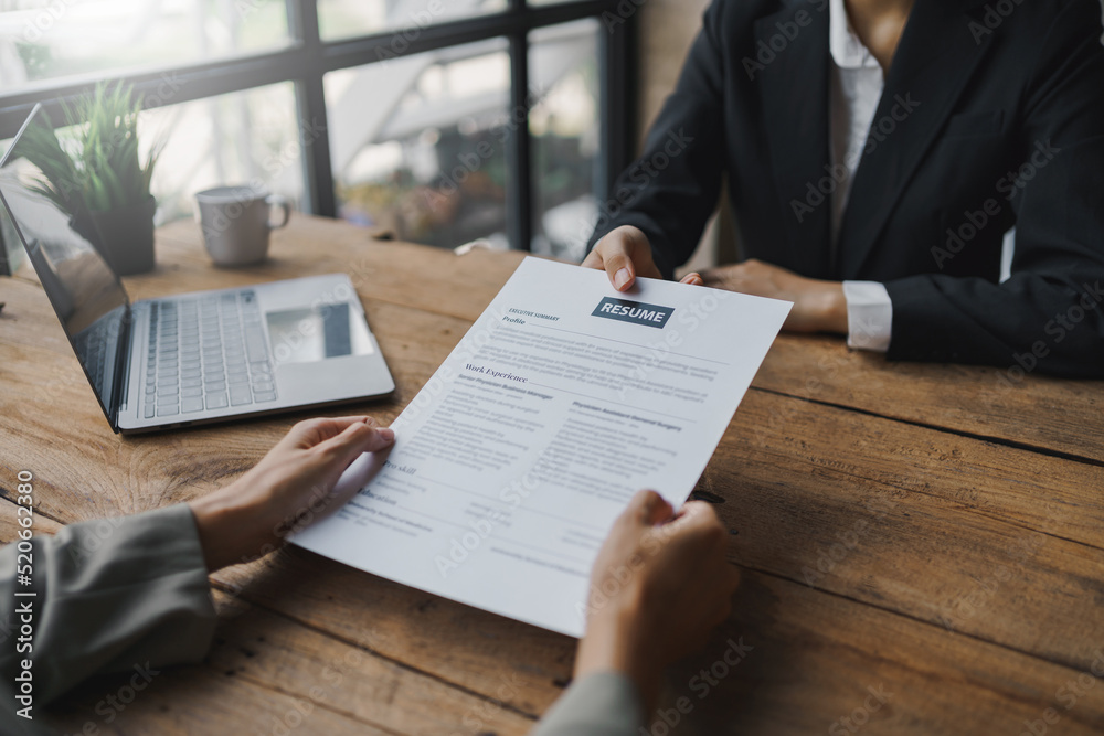 New graduate woman filling out an application form for HR department ...