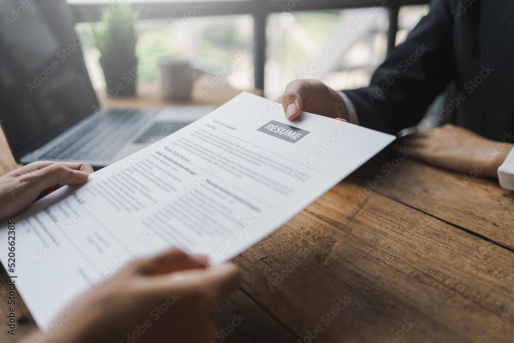 New graduate woman filling out an application form for HR department ...