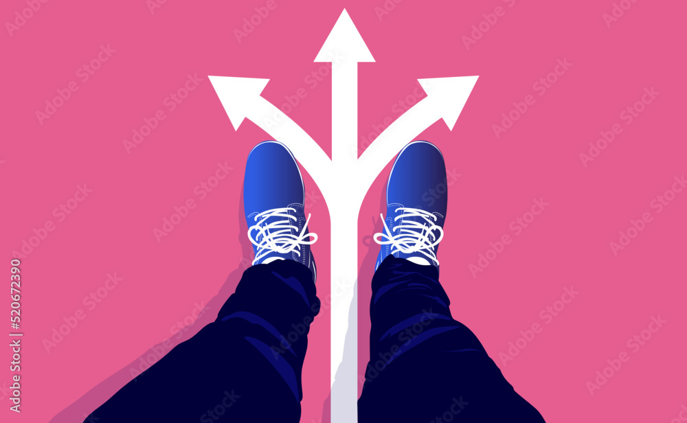 Difficult life choice - looking down on feet with arrows pointing in ...