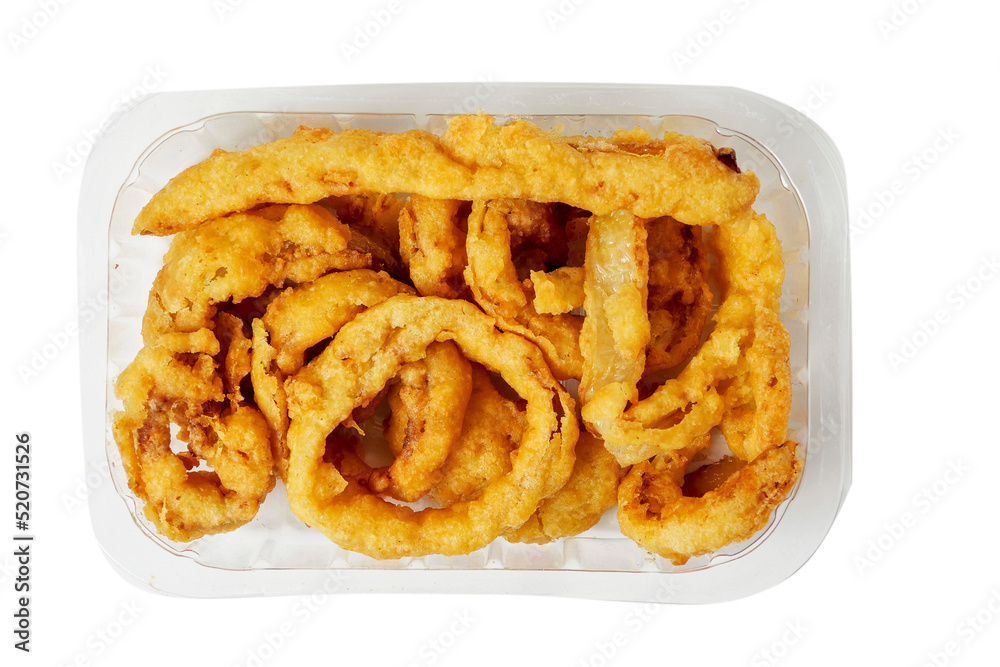 Onion rings in a plastic tray on white background. Simple food with ...