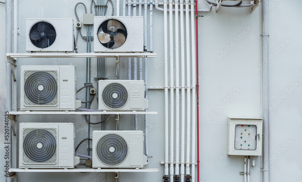 outdoor air conditioner multiple air compressors Installed outside ...