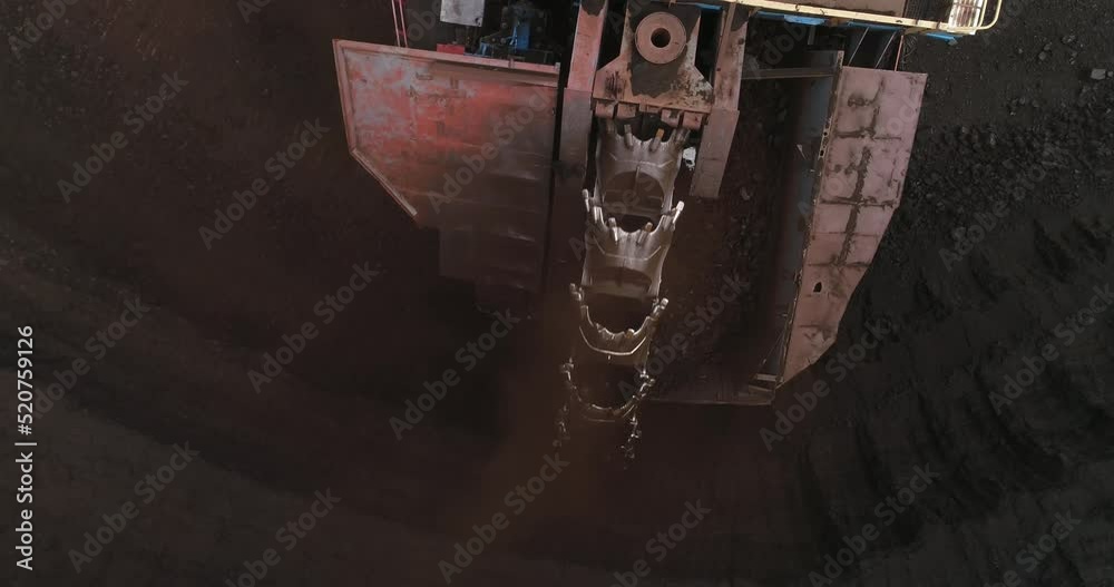 Huge industrial machine. Giant rotary bucket. Coal mining. Mining ...