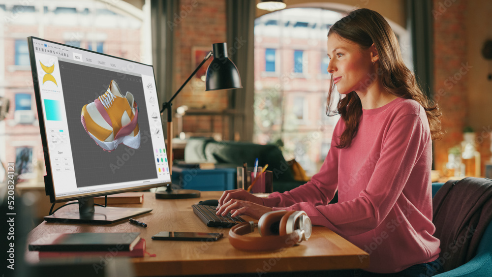 Caucasian Woman Design Video Game at Her Personal Computer in a ...