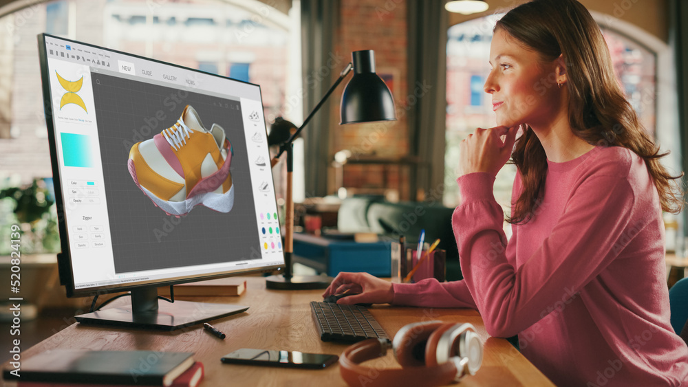 Caucasian Woman Design Video Game at Her Personal Computer in a ...