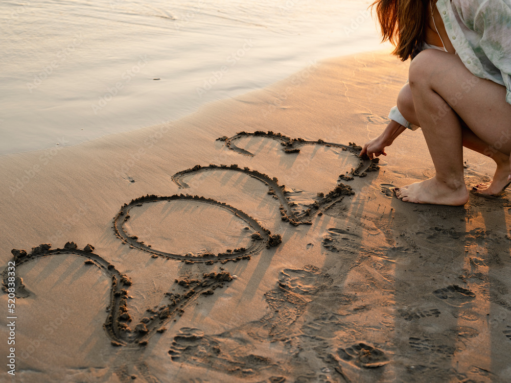 Happy New Year 2023 sign on sandy beach Stock Photo | Adobe Stock
